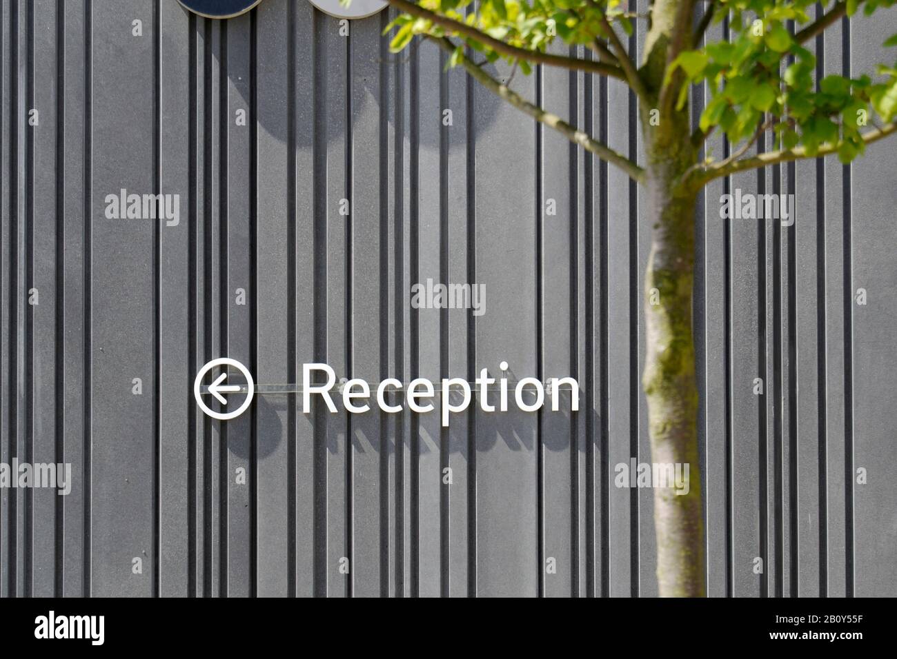 Guide to hotel reception Stock Photo - Alamy