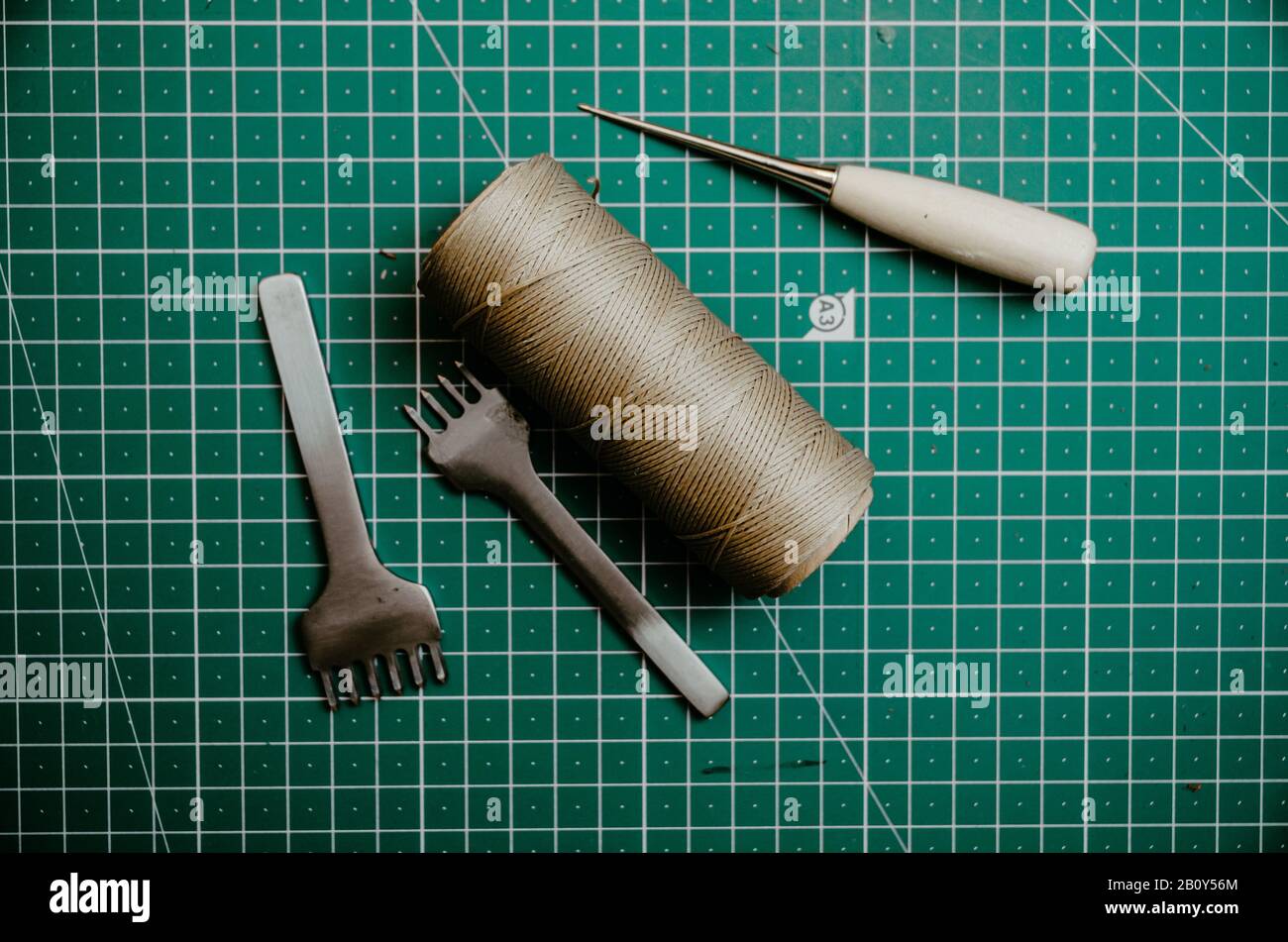 Leather crafting tools still life. handmade. leather tools Stock Photo ...