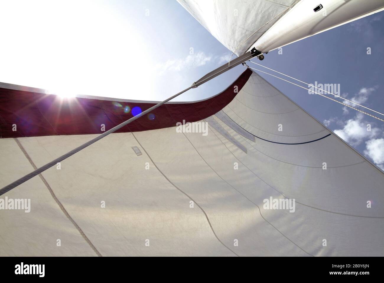 Backlit canvas, sailing yacht, sail Stock Photo - Alamy
