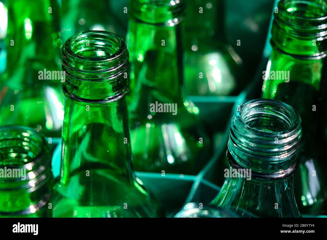 A shot of empy glass bottles ready to be recycled Stock Photo - Alamy