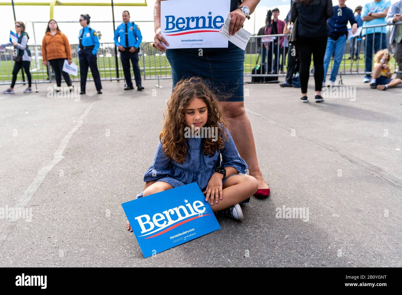 Santa Ana, United States. 21st Feb, 2020. A young girl holds a Bernie ...