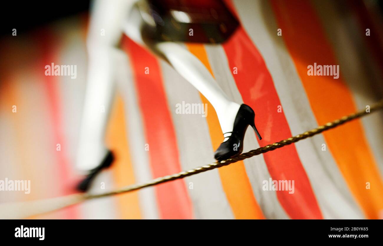 Doll on rope, shop window, tightrope walk, Hanseatic city Stock Photo ...