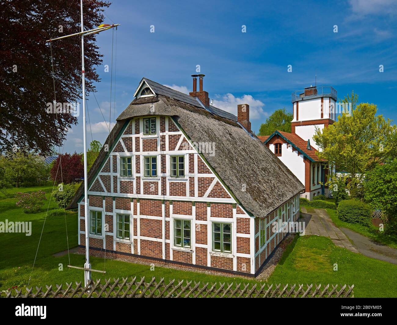 Altlander hof with old lighthouse in grunendeich luhe hi-res stock ...