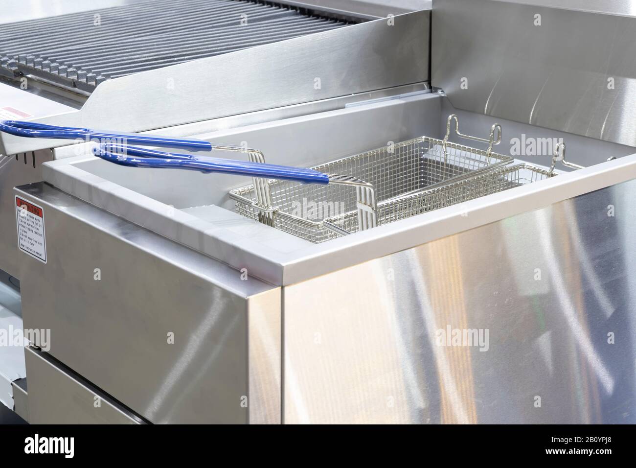 New empty modern professional deep fryer basket for kitchen restaurant ...