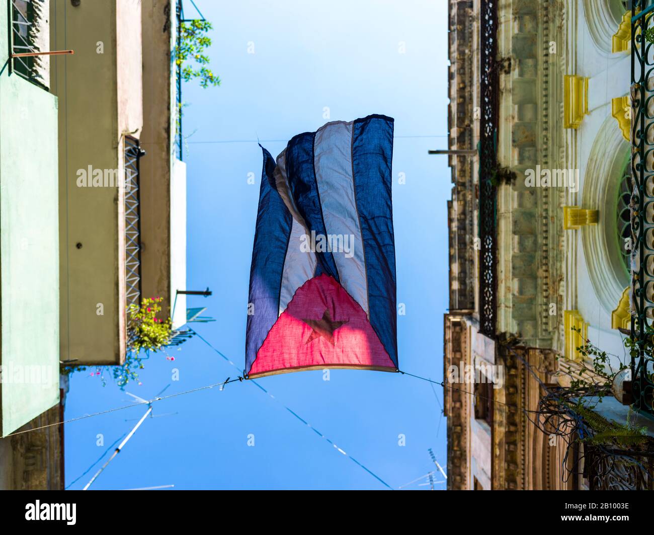 National flag in a narrow alley, Havana, Cuba Stock Photo - Alamy