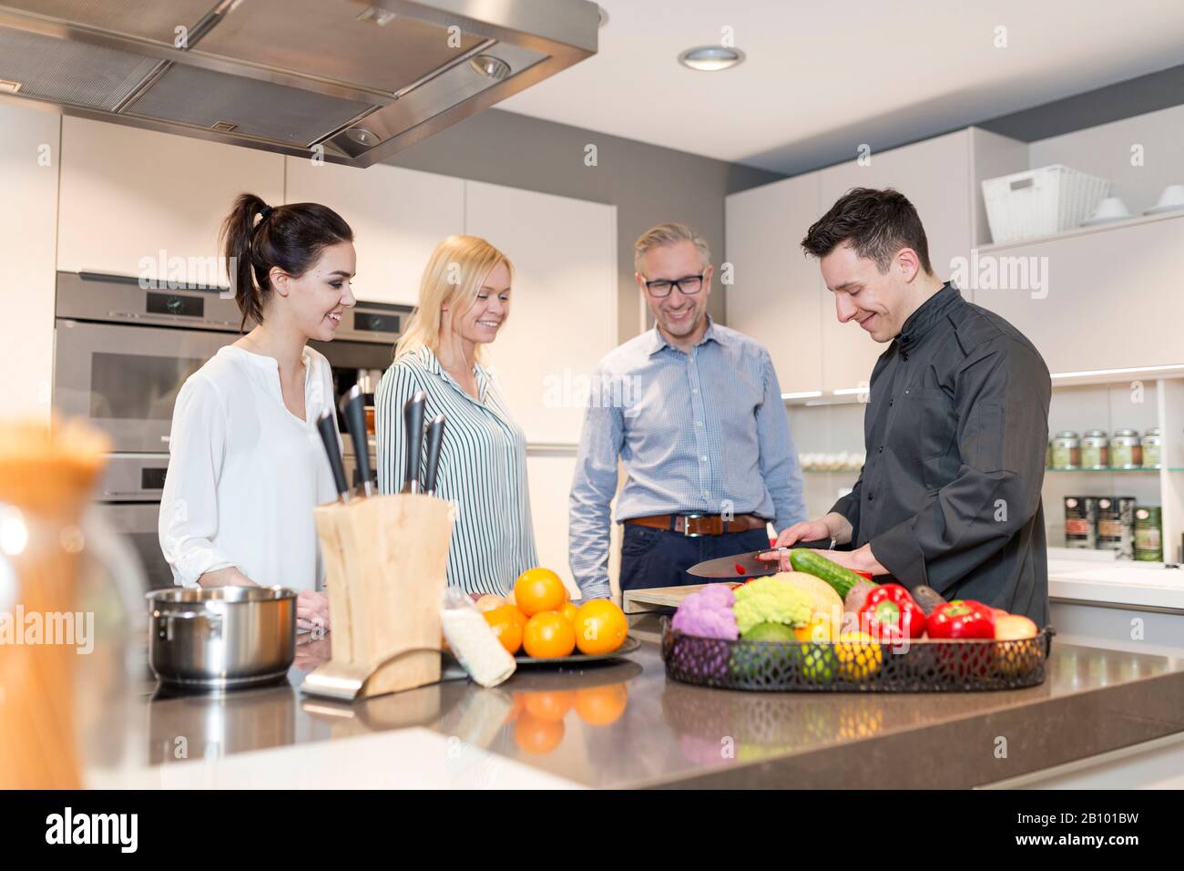 Cook gives a cooking class Stock Photo - Alamy