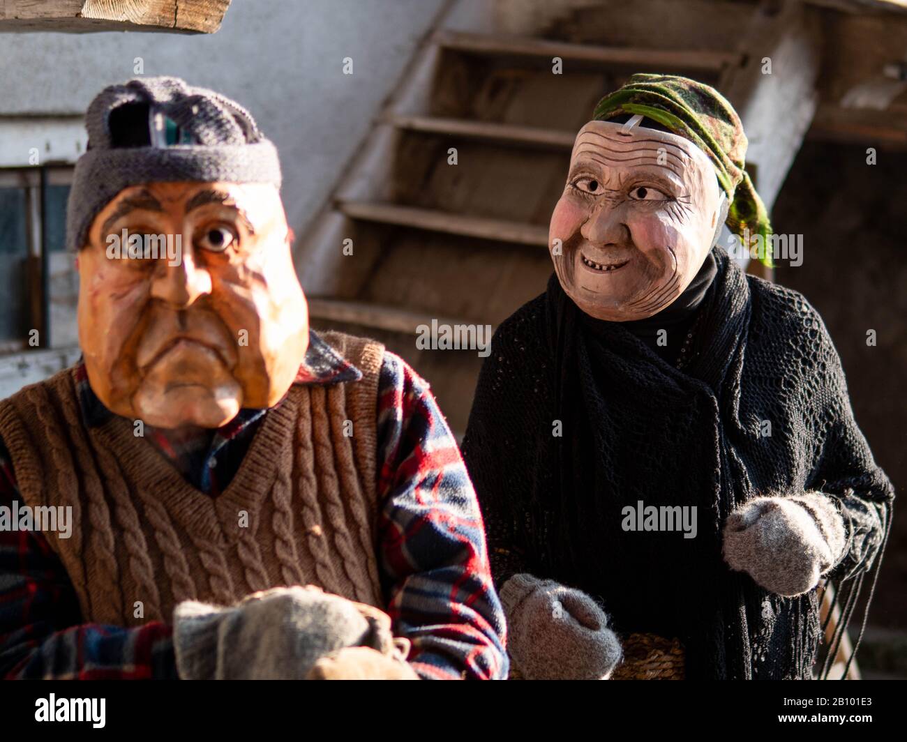 Revellers wearing masks take part during the carnival.Traditional ...