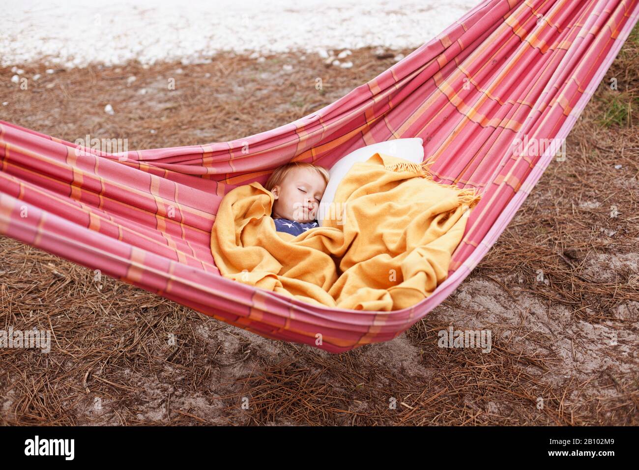 Boy in a hammock hi-res stock photography and images - Alamy