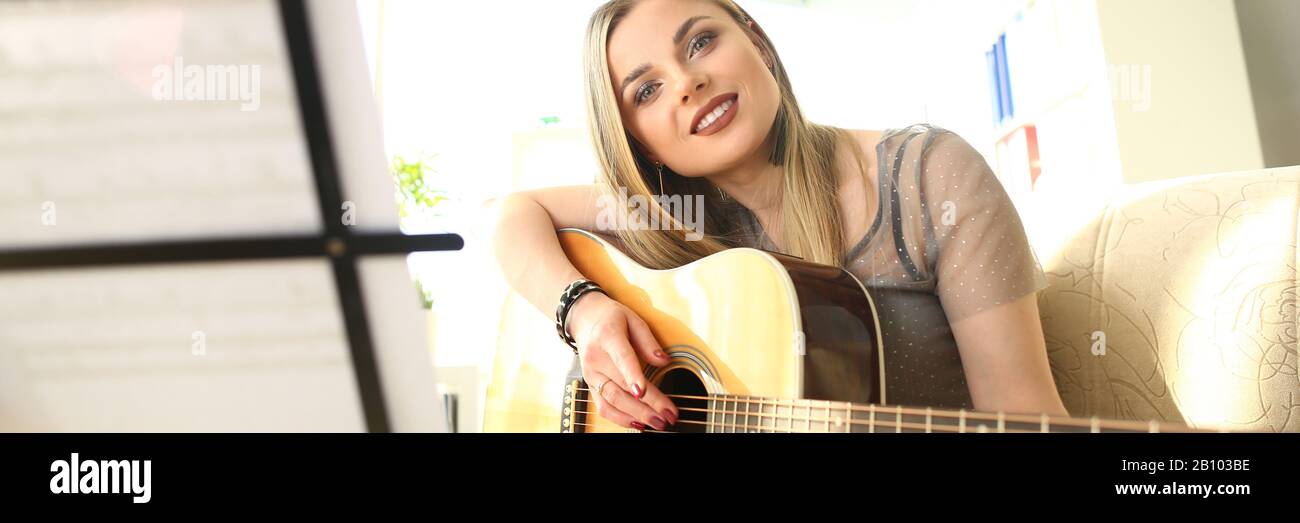 Guitar Playing Lesson Pretty Woman Hold Instrument Stock Photo - Alamy