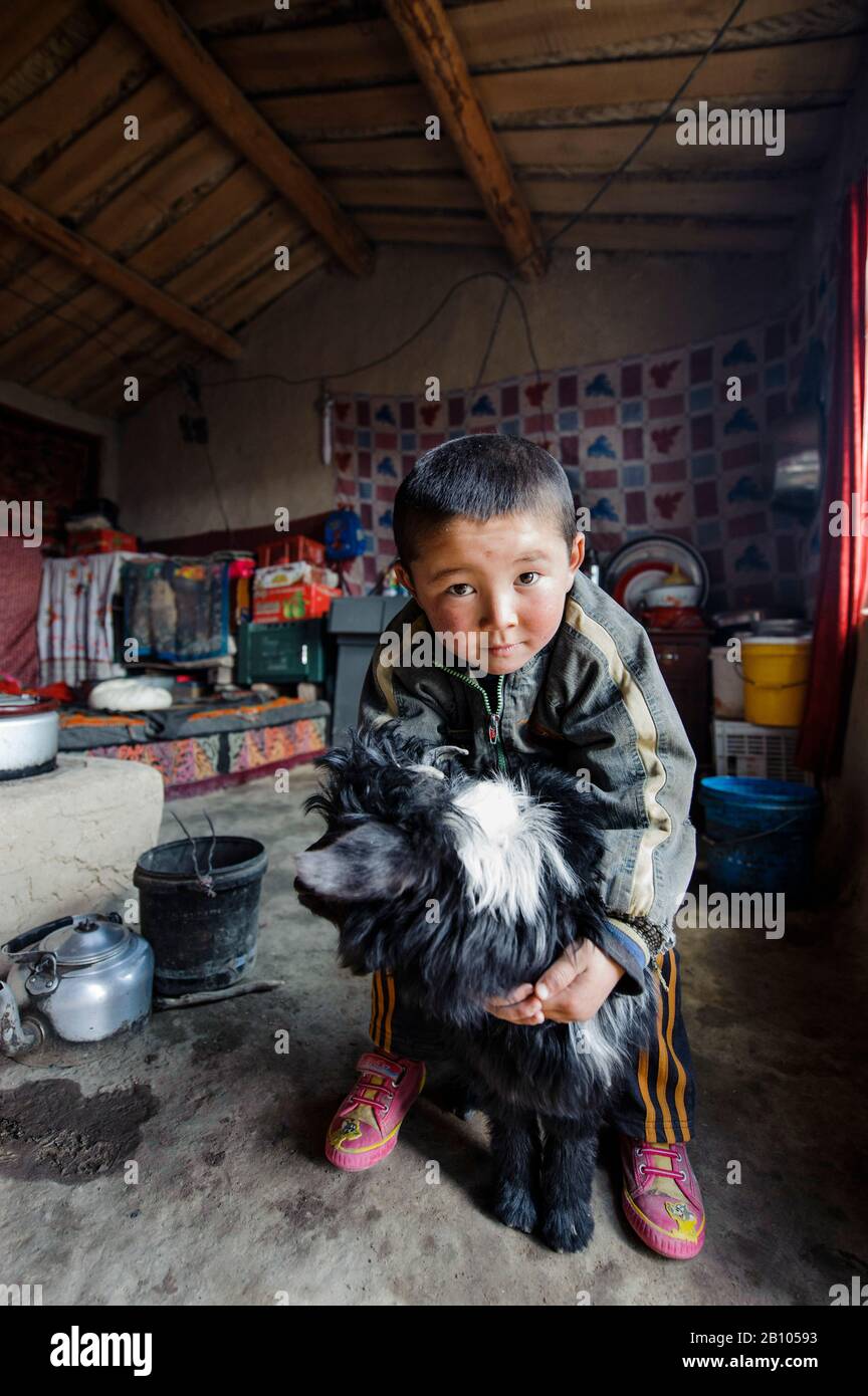 Kids in remote xinjiang have very few possesions and pets are their ...