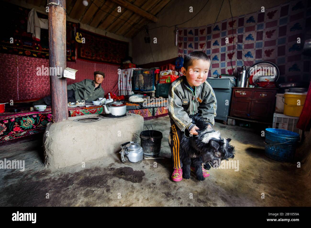 Kids in remote xinjiang have very few possesions and pets are their ...