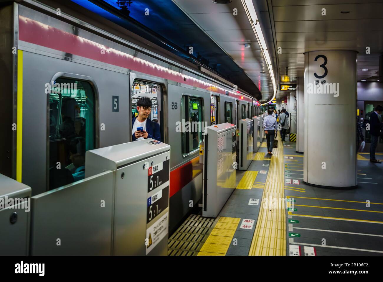 Passengers alighted the train and move on at subway underground station ...