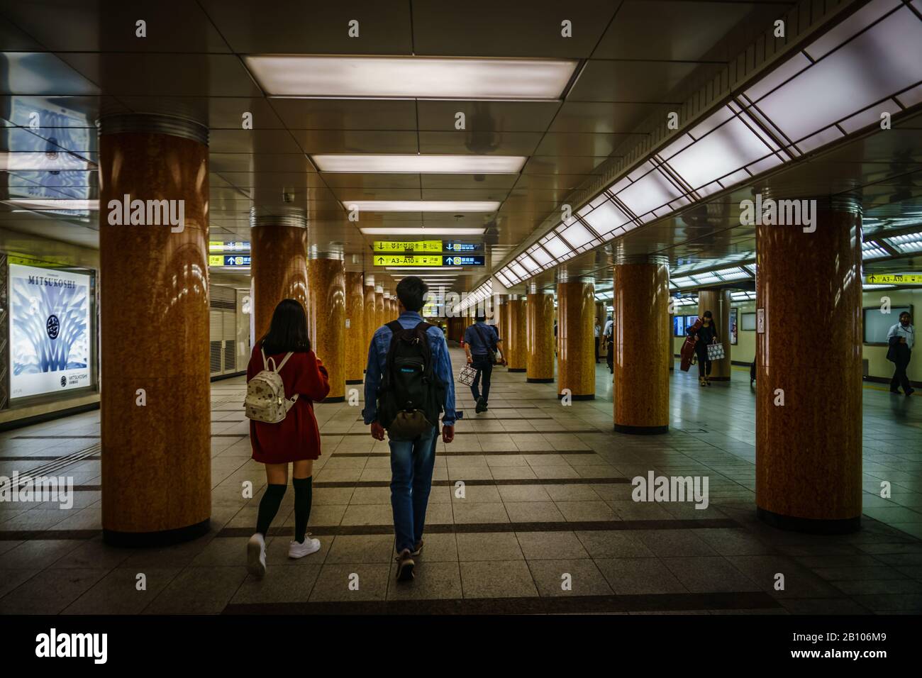 Tokyo Subway underground station, with commuters moving around Stock ...