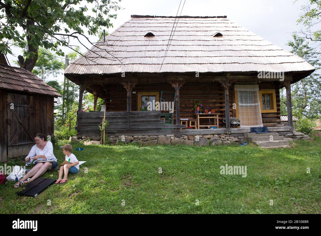 Old wooden houses and barns in the village of Breb, Romania Stock Photo ...