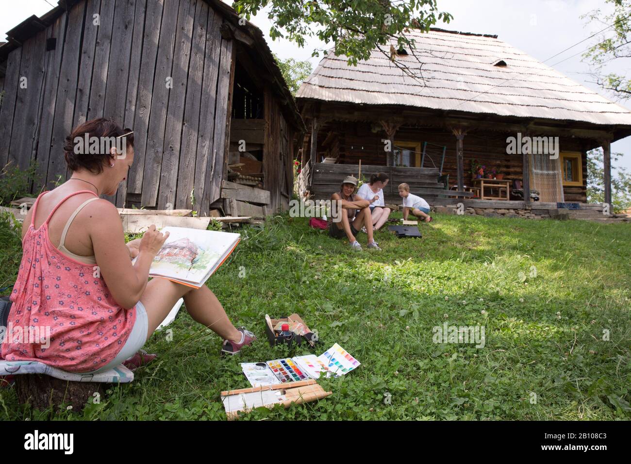 Old wooden houses and barns in the village of Breb, Romania Stock Photo ...