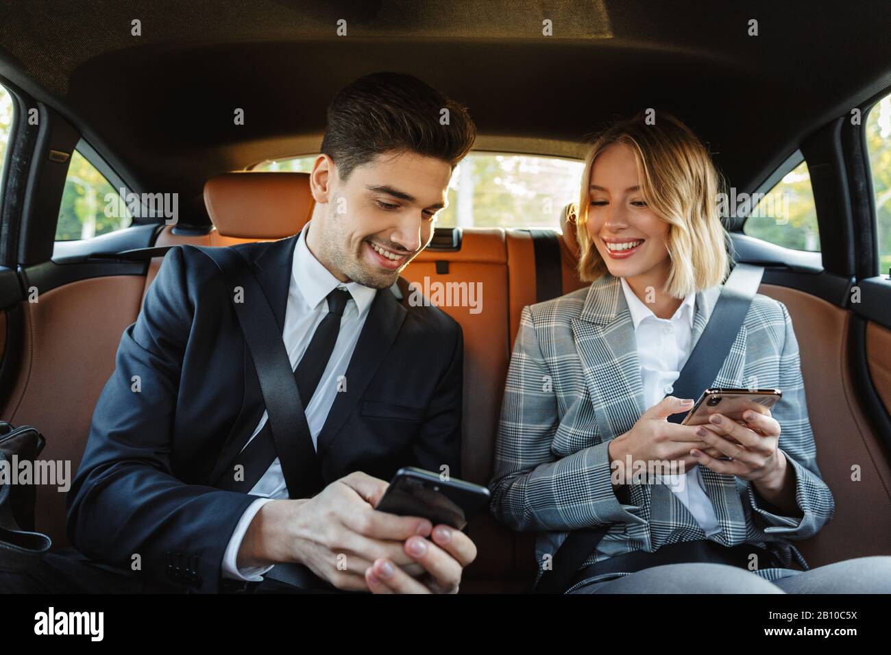 Image Of Young Caucasian Businesslike Man And Woman In Formal Wear