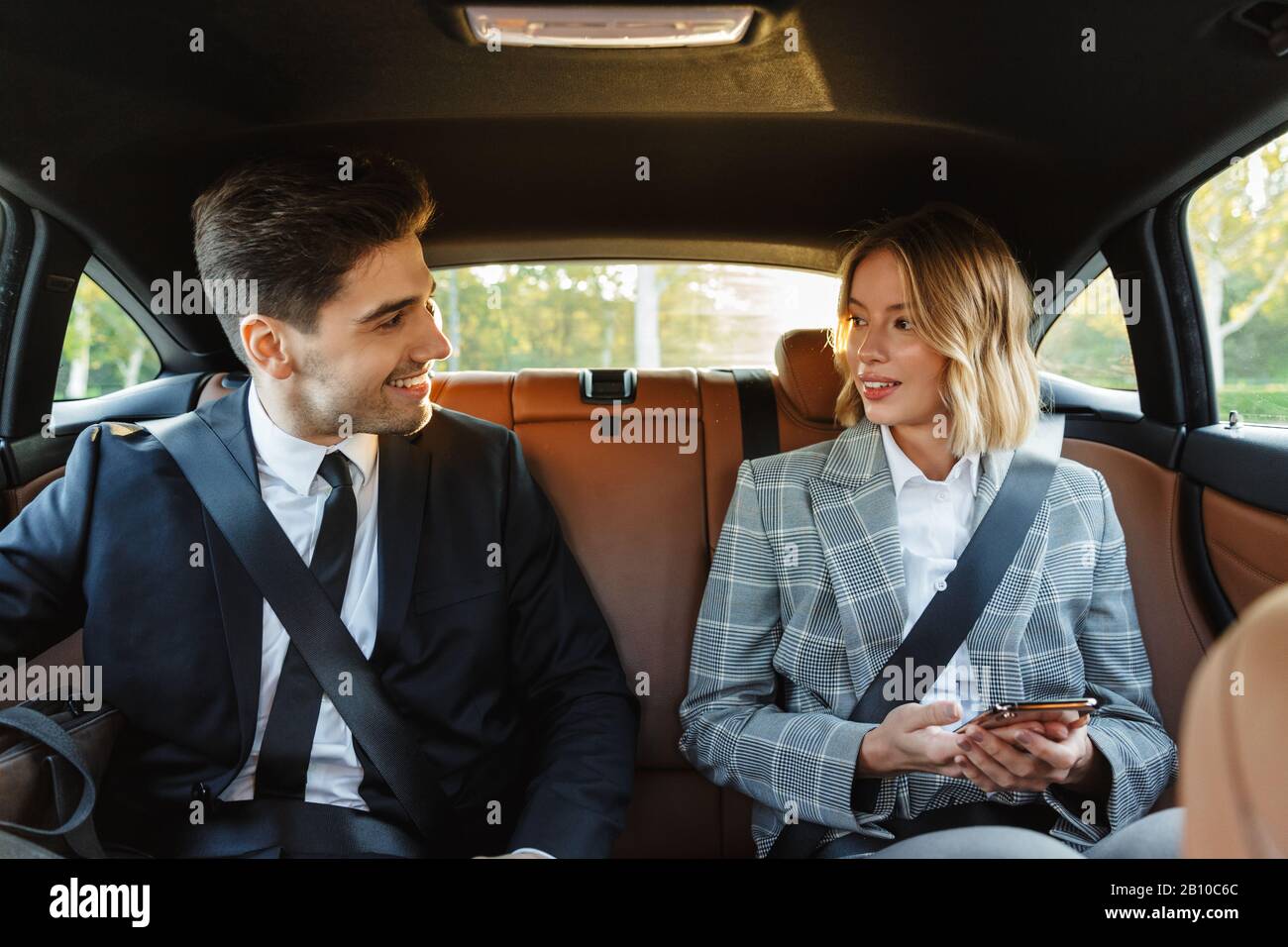 Image Of Young Caucasian Businesslike Man And Woman In Formal Wear