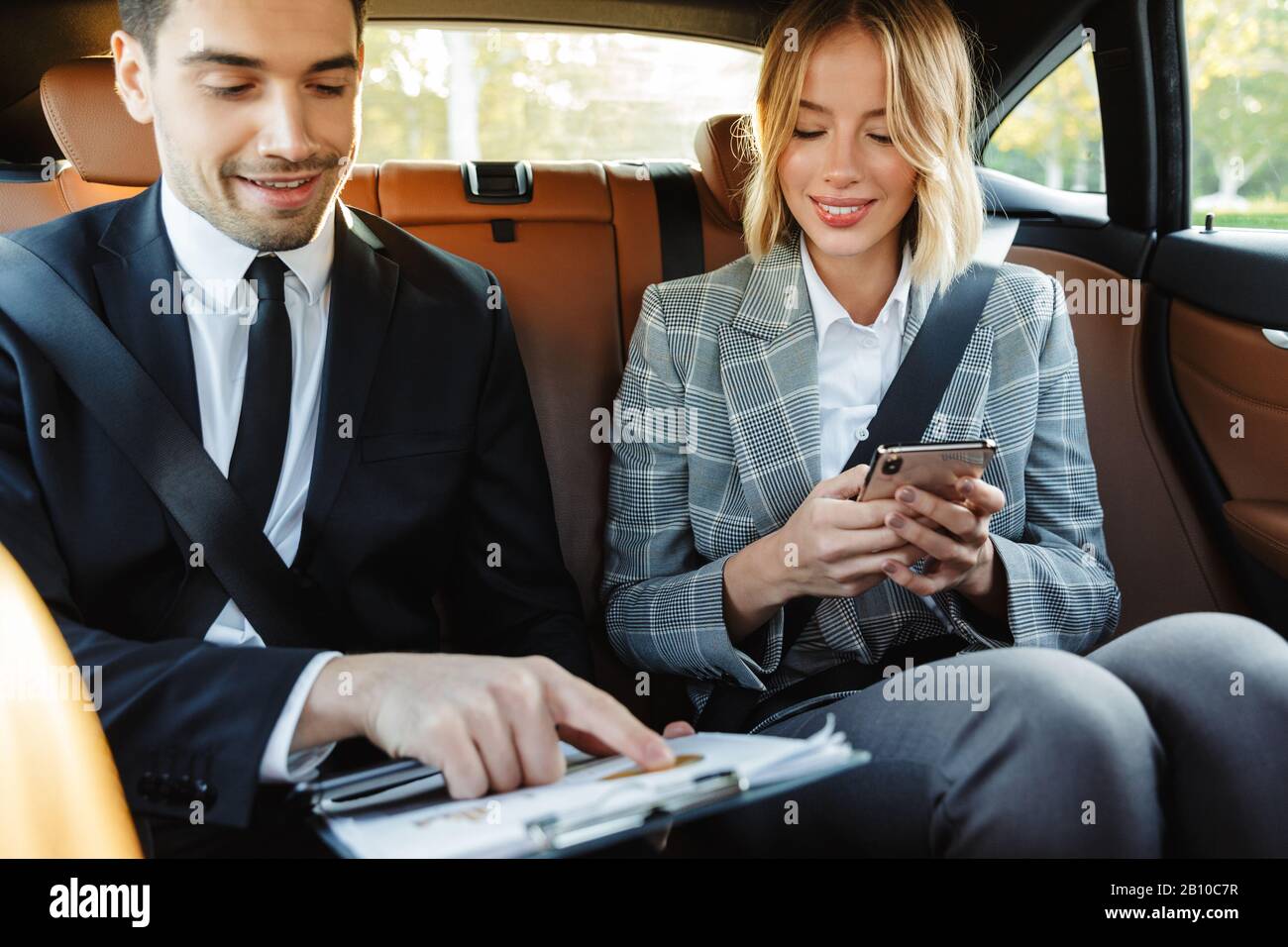 Image Of Young Caucasian Businesslike Man And Woman In Formal Wear
