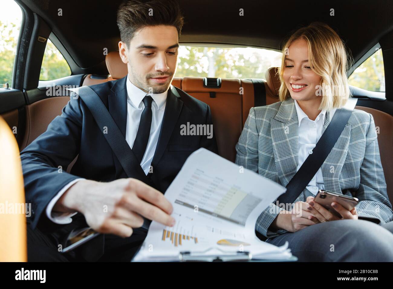 Image Of Young Caucasian Businesslike Man And Woman In Formal Wear