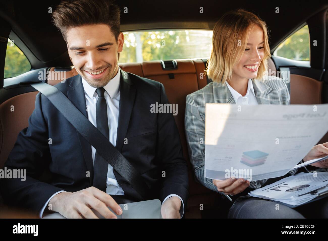 Image Of Young Caucasian Businesslike Man And Woman In Formal Wear