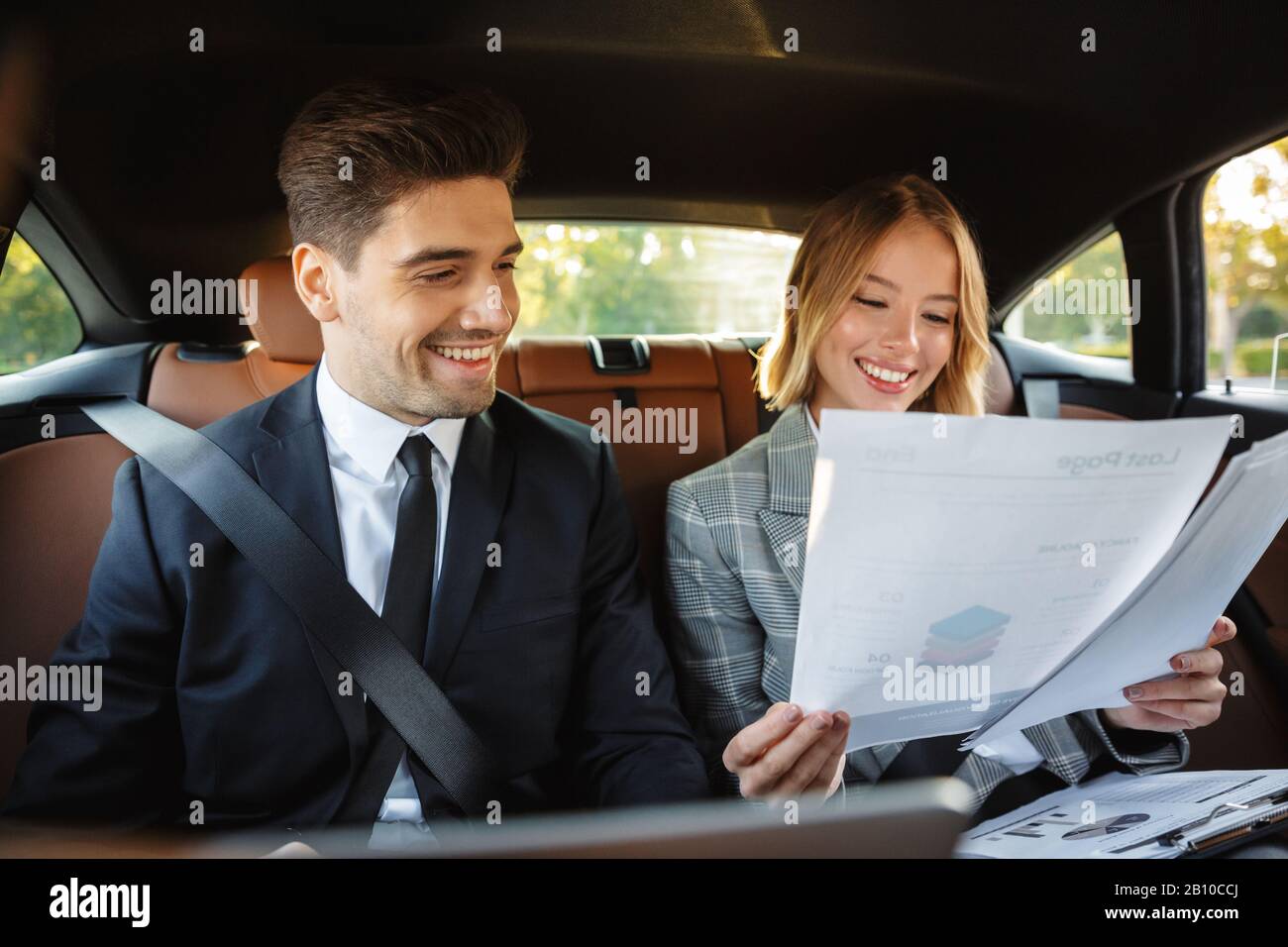 Image Of Young Caucasian Businesslike Man And Woman In Formal Wear