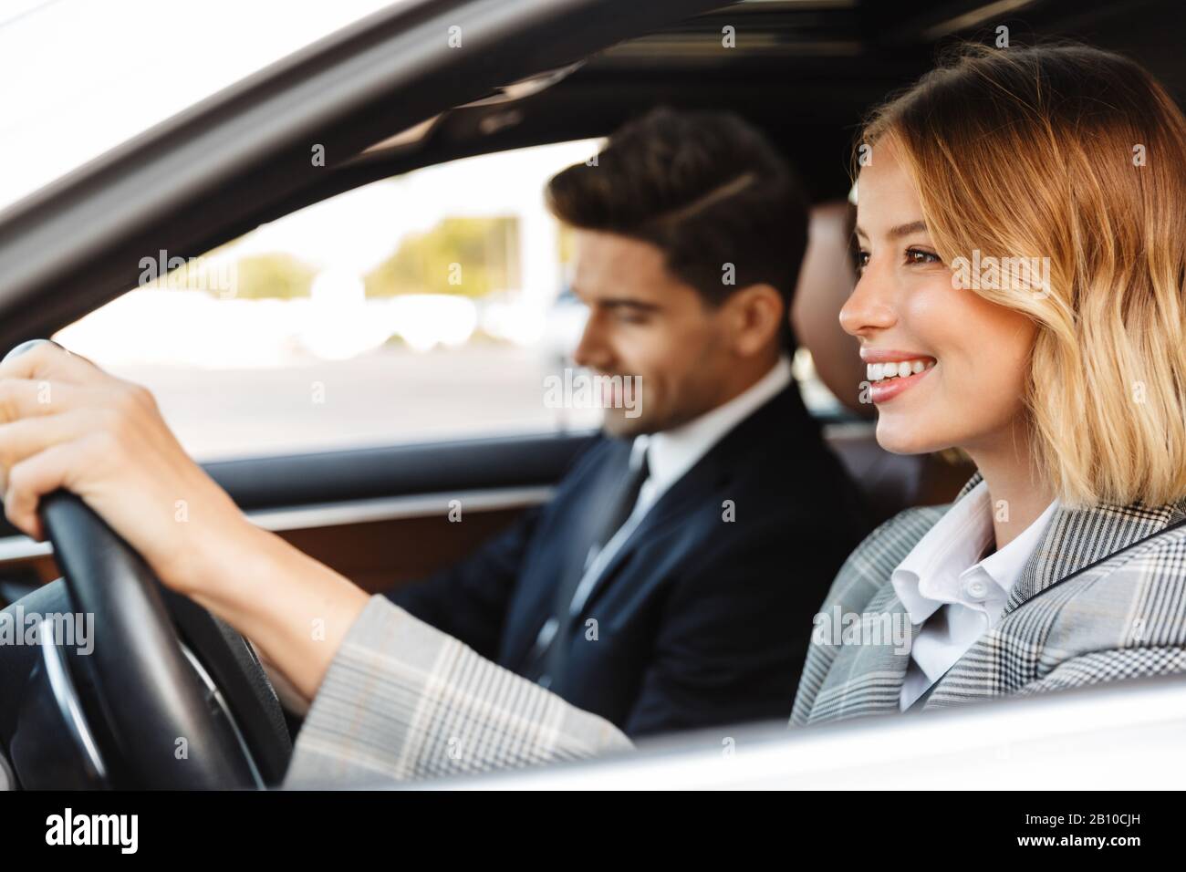Image Of Young Caucasian Successful Businesslike Man And Woman In