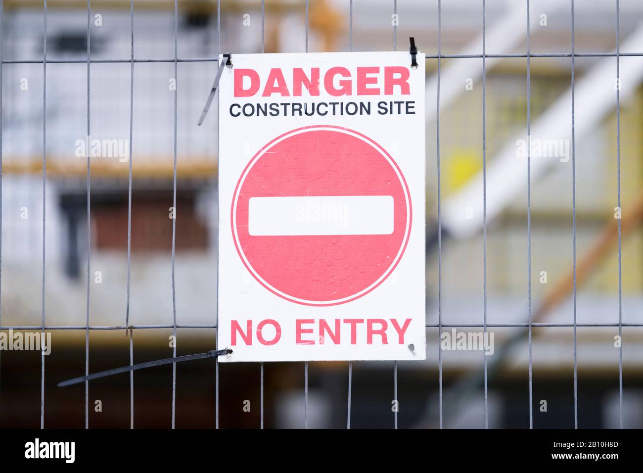 Construction danger no entry sign on entrance fence Stock Photo - Alamy