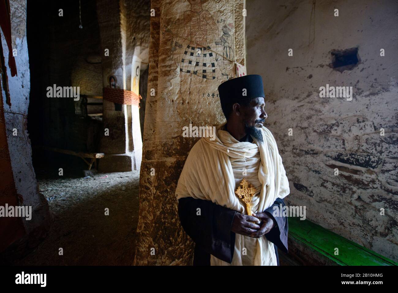 Priest of the Ethiopian Orthodox Church in the Abba Yohanni Rock Church ...