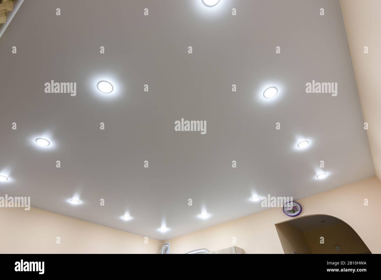 The general plan of the stretch ceiling is full of point lamps around ...