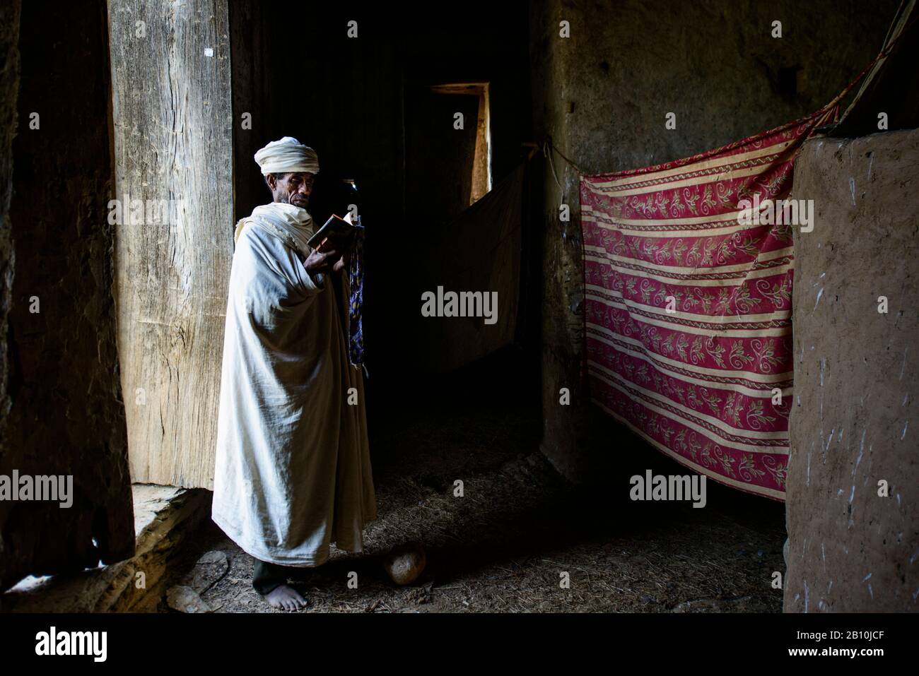 Ethiopian Orthodox Church priest reads the Bible, Tigray, Ethiopia ...