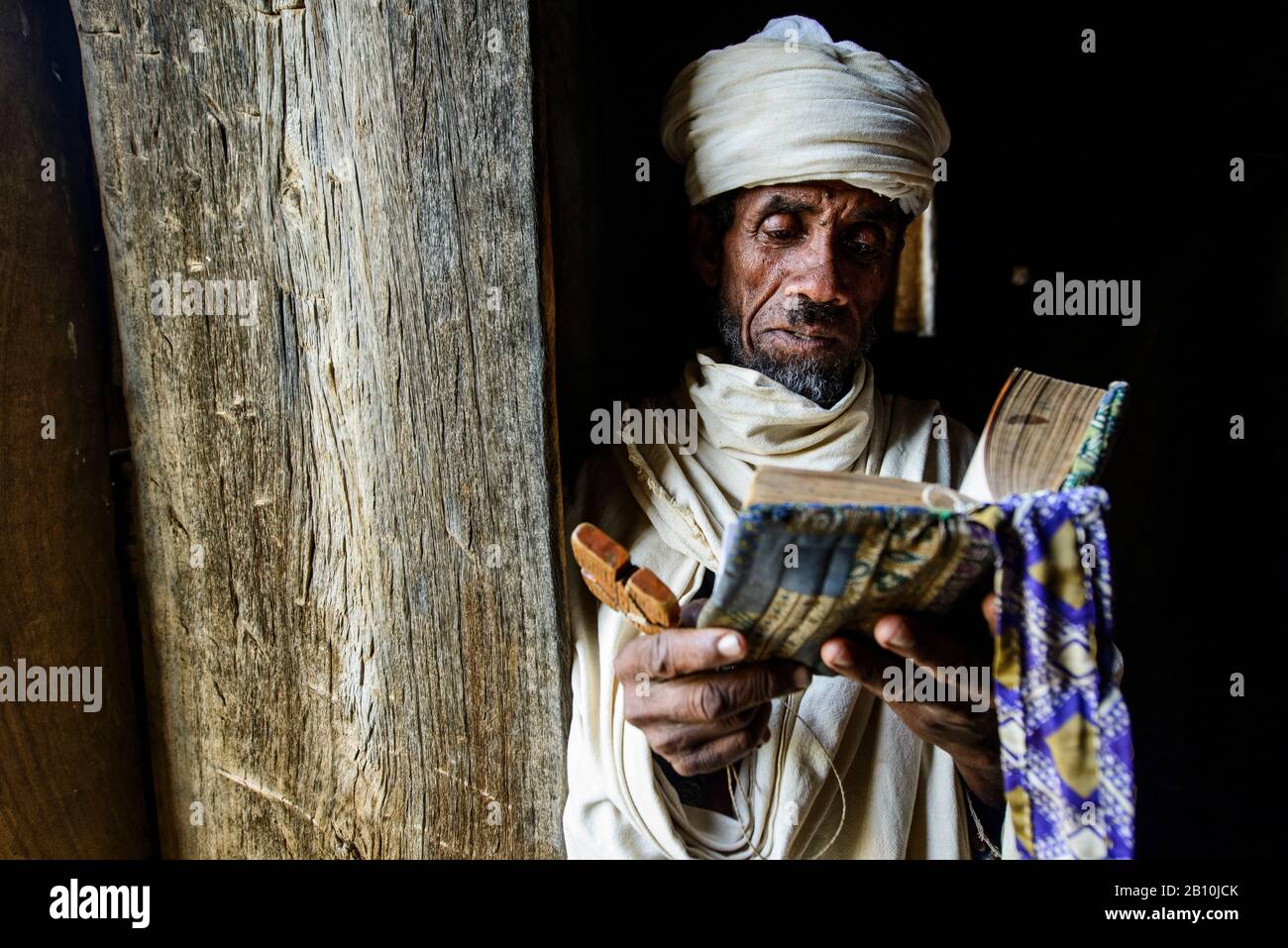 Ethiopian Orthodox Church priest reads the Bible, Tigray, Ethiopia ...