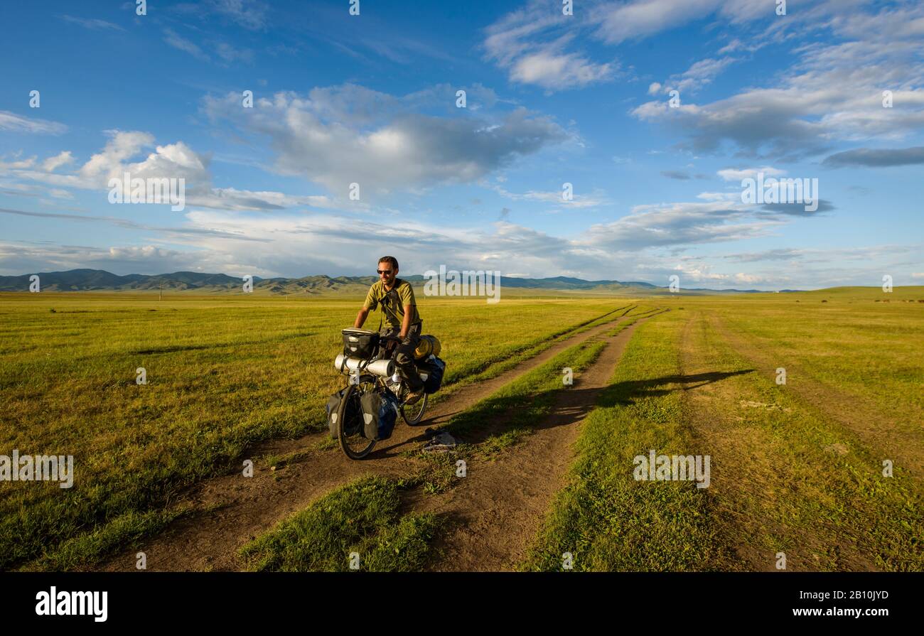 Cycling in the Mongolian steppe, Mongolia Stock Photo - Alamy
