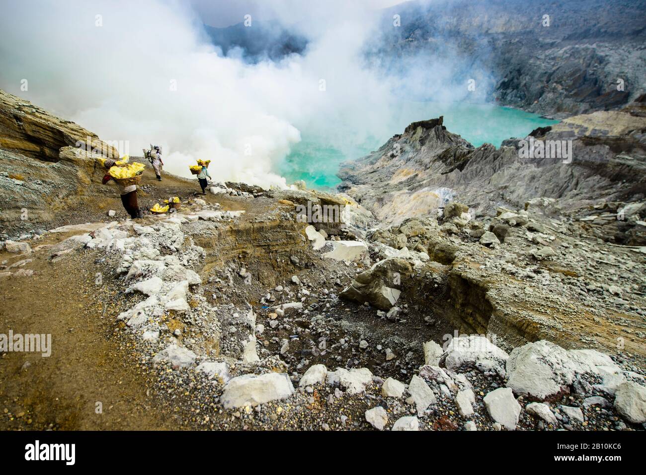 Sulfur mining on the crater lake of the Ijen volcano, Java, Indonesia ...