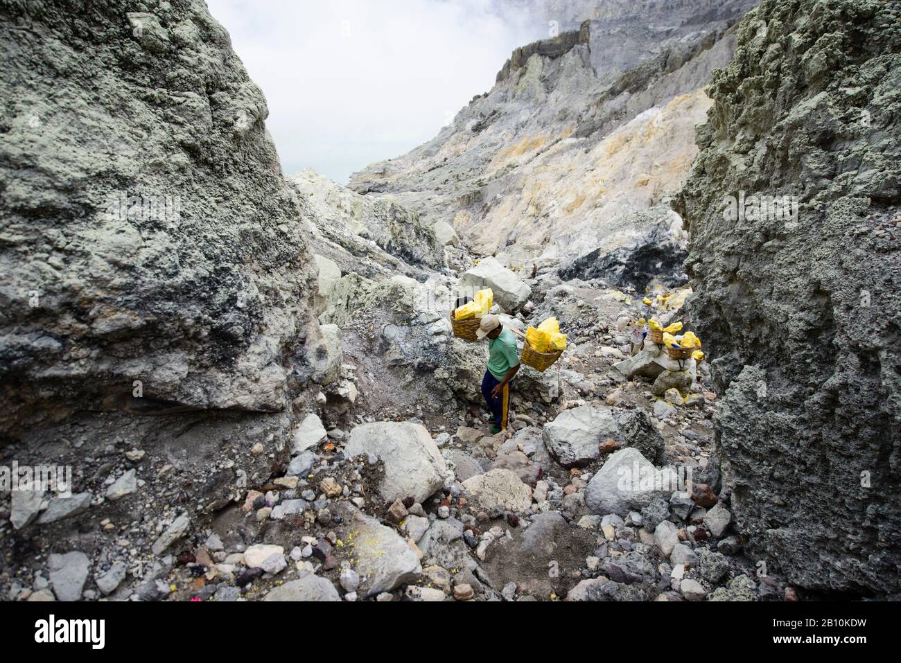 Sulfur mining on the crater lake of the Ijen volcano, Java, Indonesia ...