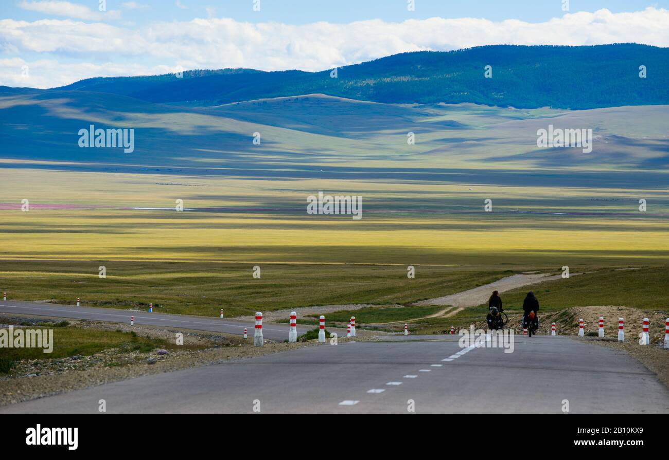 Cycling in the Mongolian steppe, Mongolia Stock Photo - Alamy