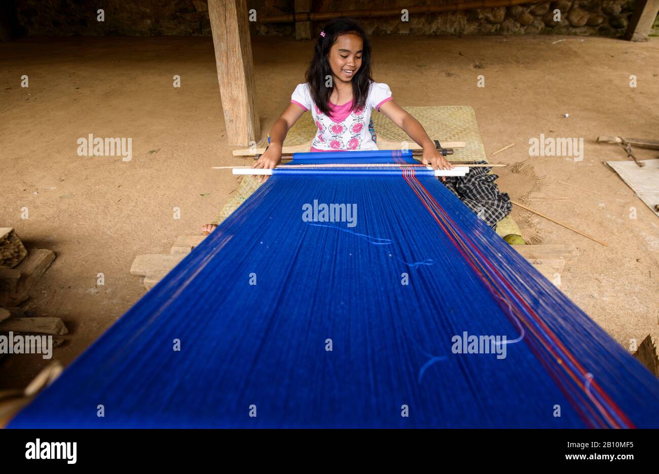 Girl weaves textiles hi-res stock photography and images - Alamy