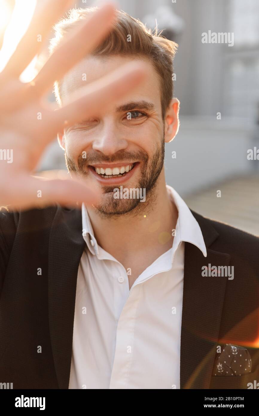 Beautiful stylish man waving smiling hi-res stock photography and ...
