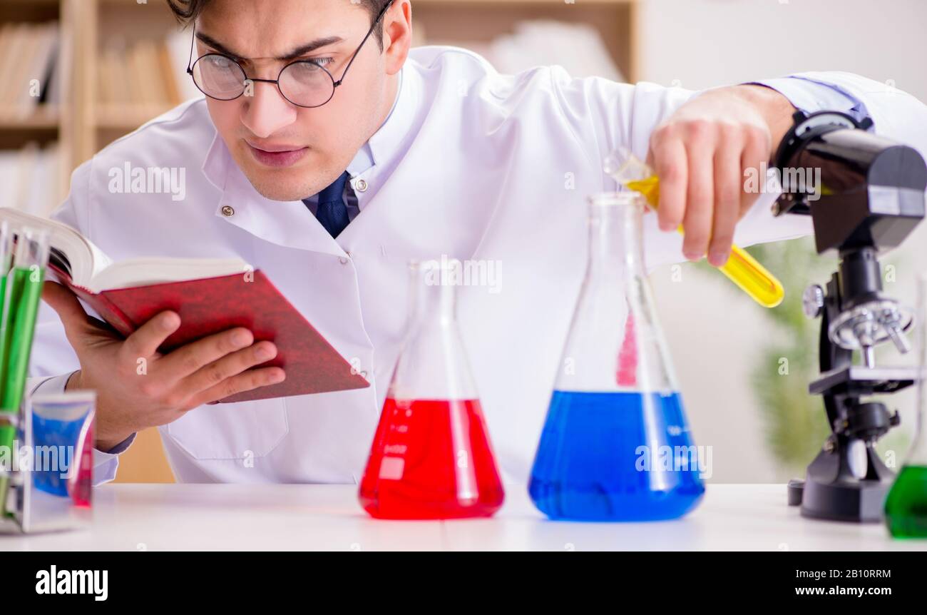 The mad crazy scientist doctor doing experiments in a laboratory Stock ...