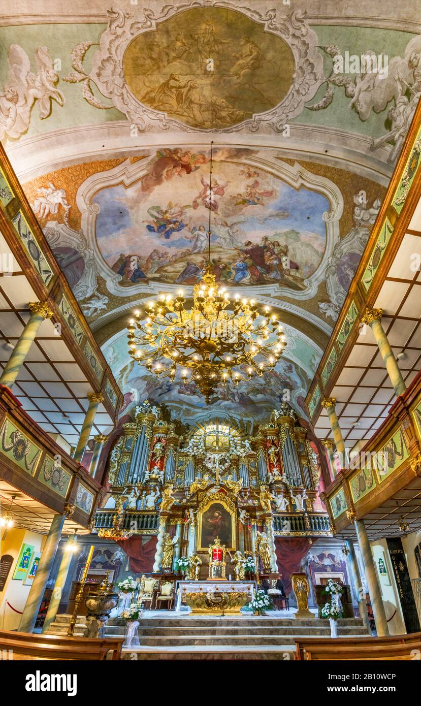 Baroque interior, with barrel vault, balconies at Church of the Feast ...