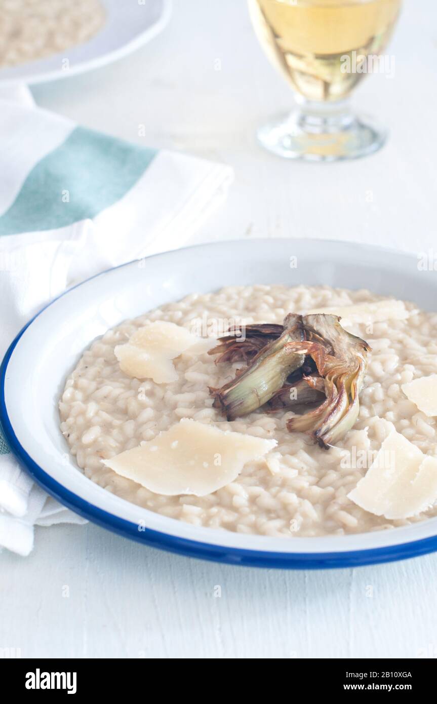 Italian risotto with artichokes and parmesan,italy Stock Photo - Alamy