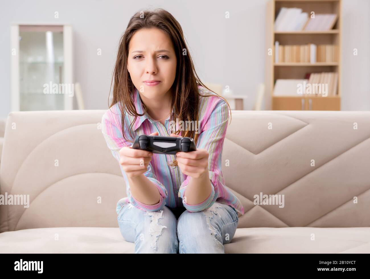 The young family suffering from computer games addiction Stock Photo ...