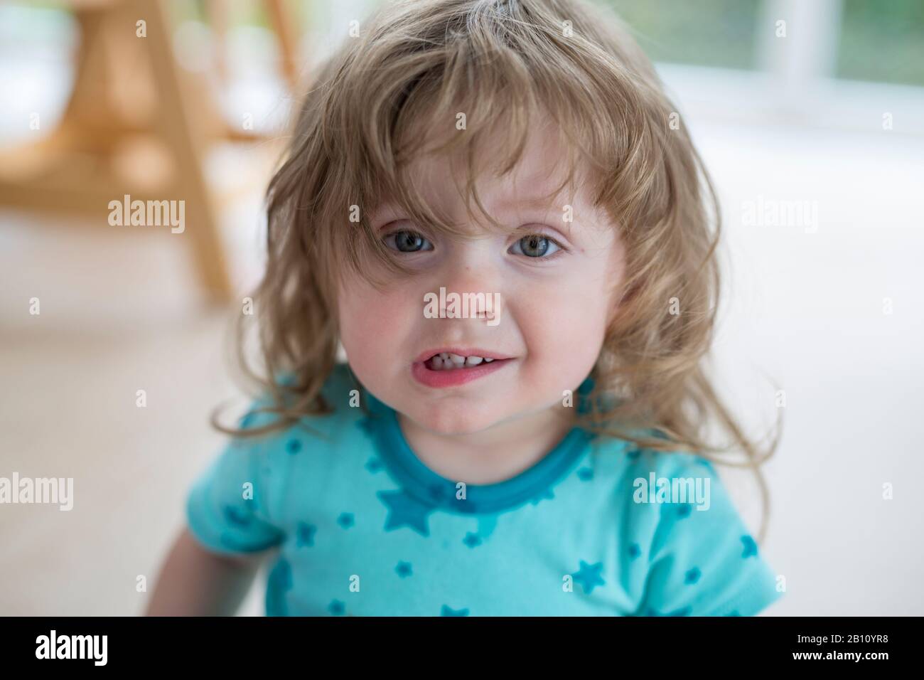 Little girl looks skeptical Stock Photo - Alamy