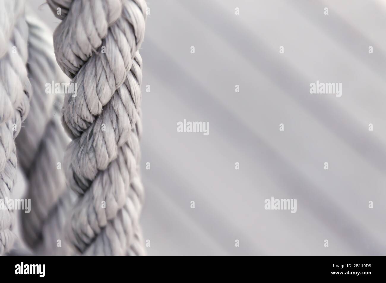 White rope on wooden background with copy space Stock Photo - Alamy