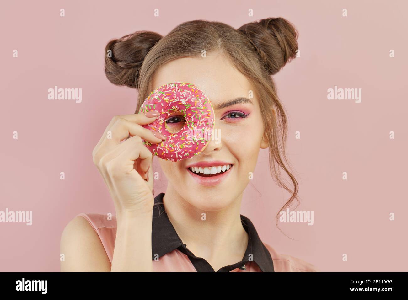 Funny young woman eating donut hi-res stock photography and images - Alamy