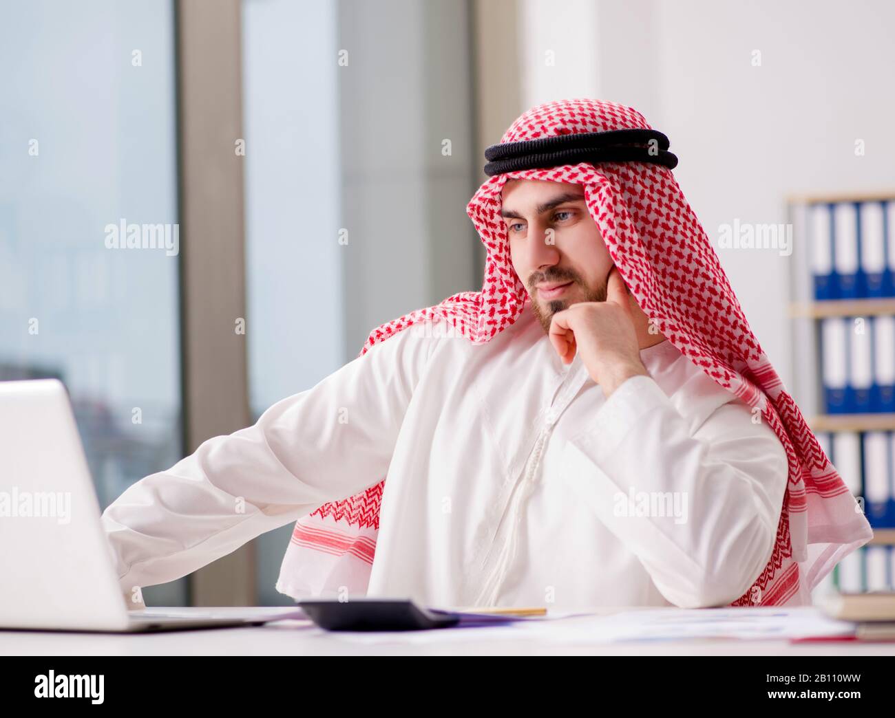 The arab businessman working on laptop computer Stock Photo - Alamy