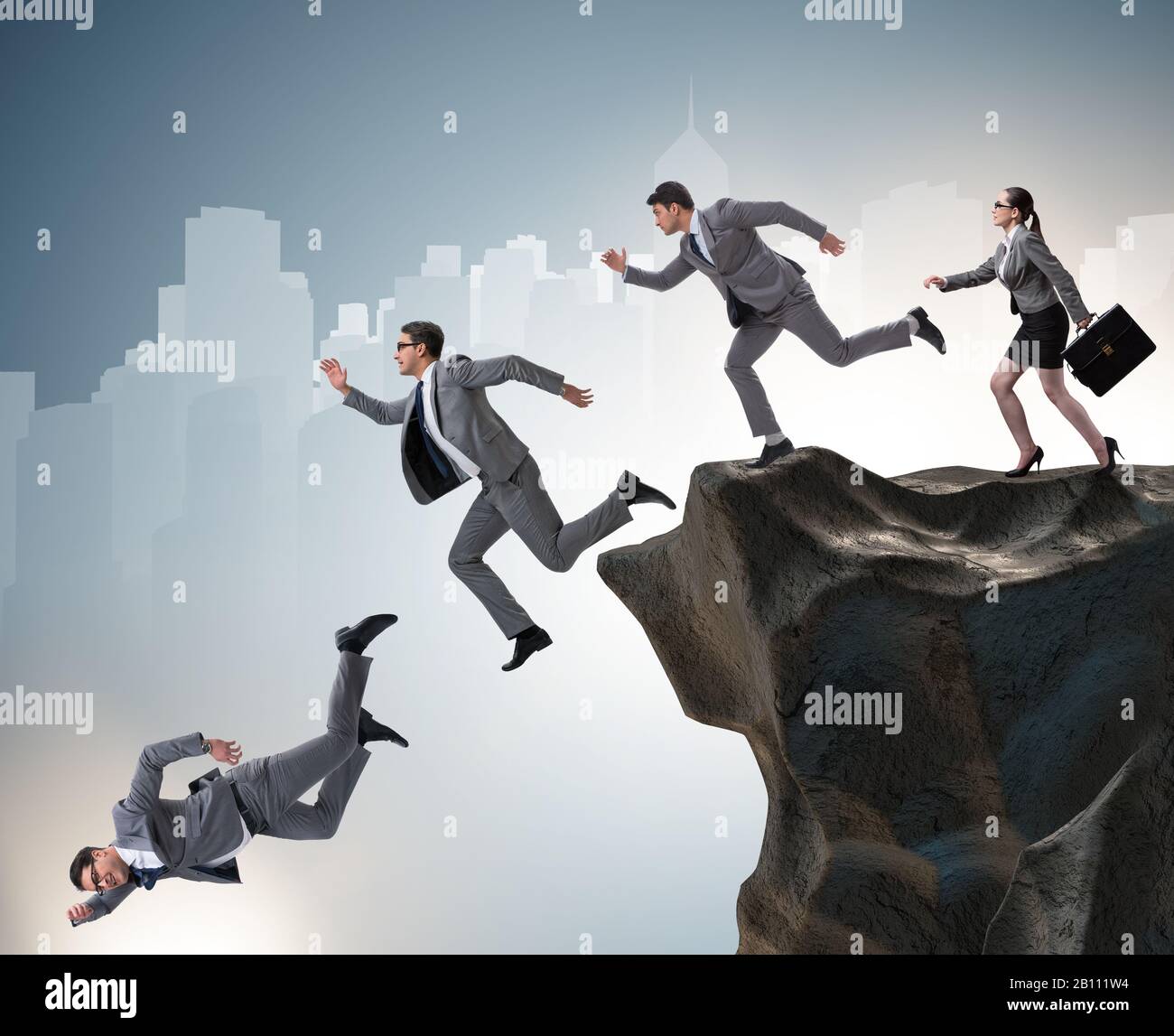 The business people falling off the cliff Stock Photo - Alamy
