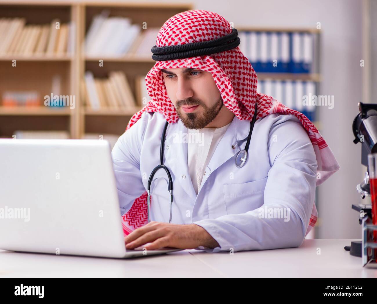 The arab doctor working in the lab hospital Stock Photo - Alamy