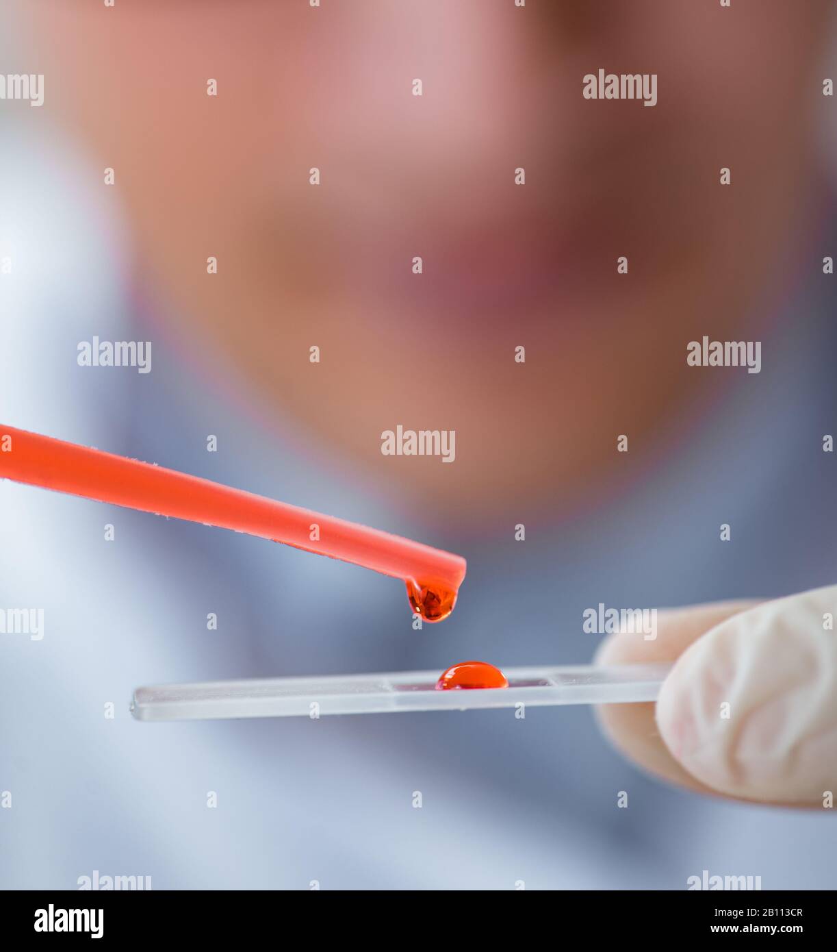 The young doctor doing the blood test Stock Photo - Alamy