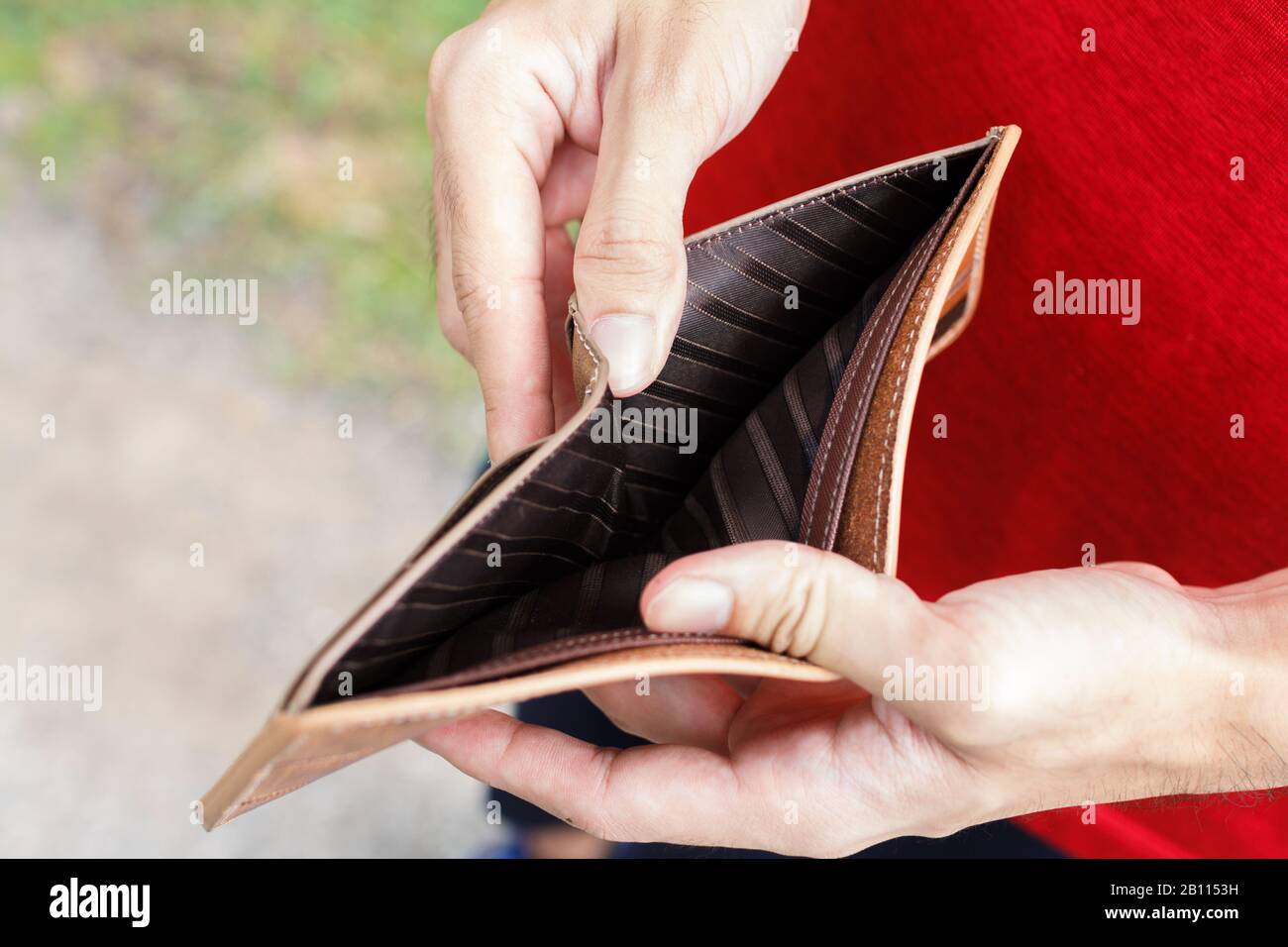 A Closeup hand man open an Empty Wallet Stock Photo - Alamy
