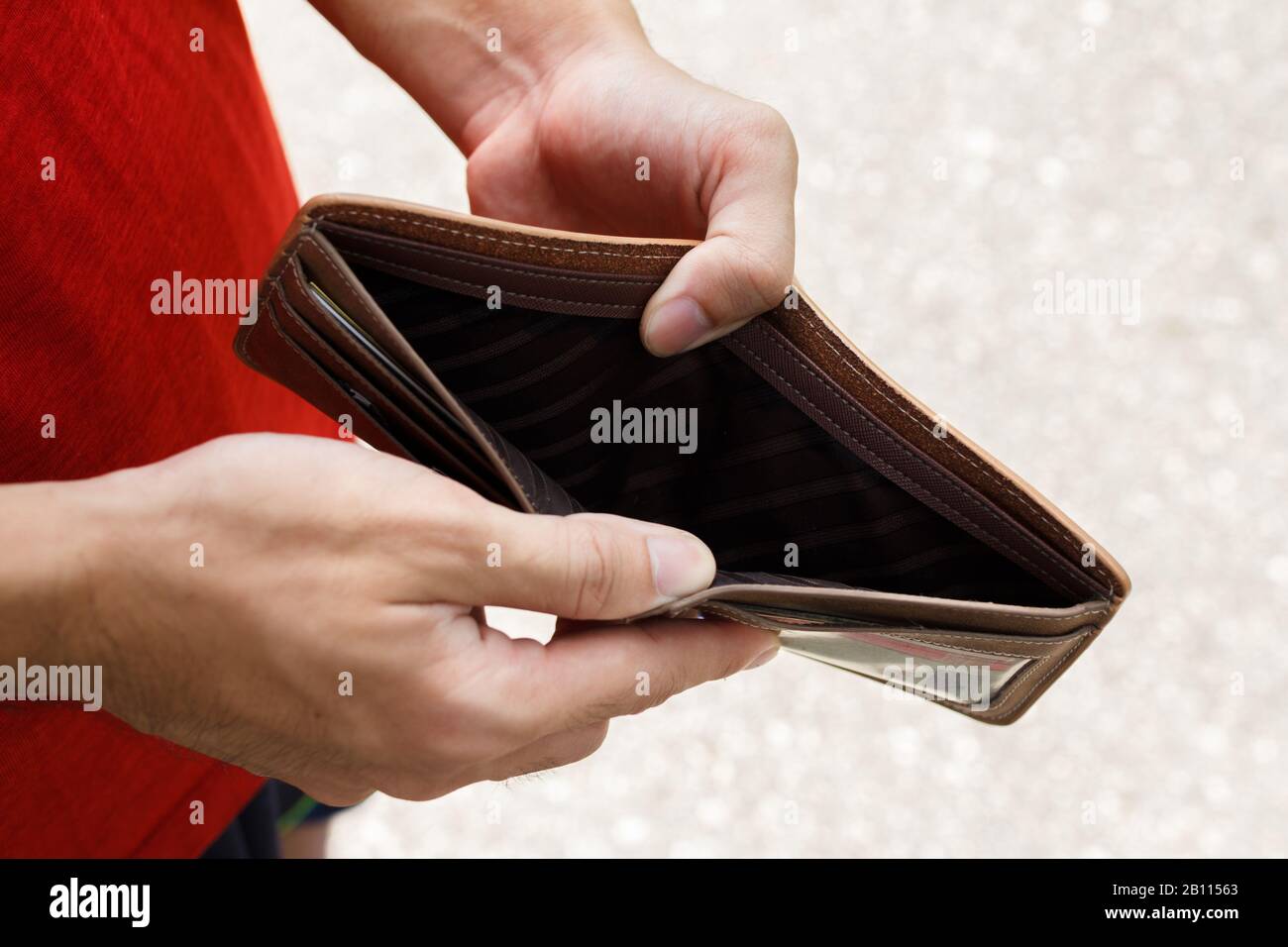 A Closeup hand man open an Empty Wallet Stock Photo - Alamy